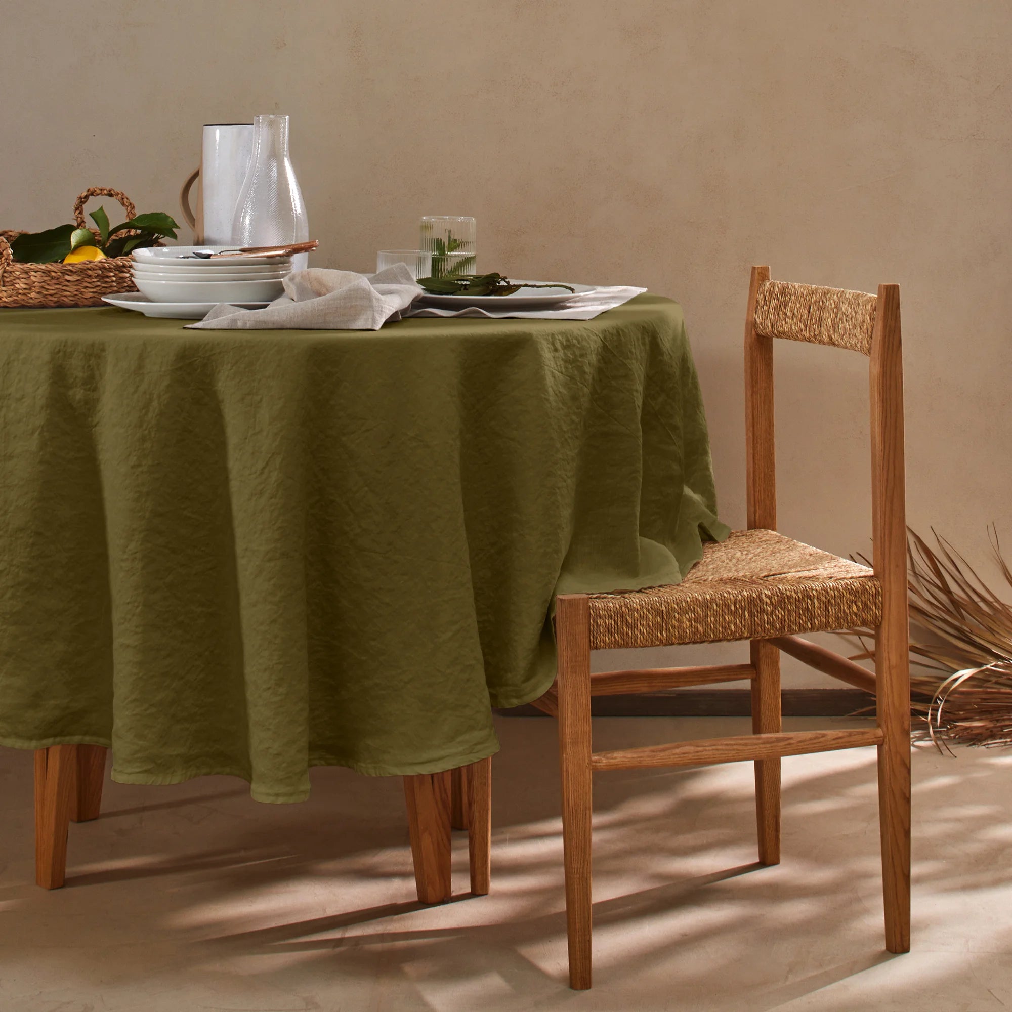 Round green olive linen tablecloth | Linenshed